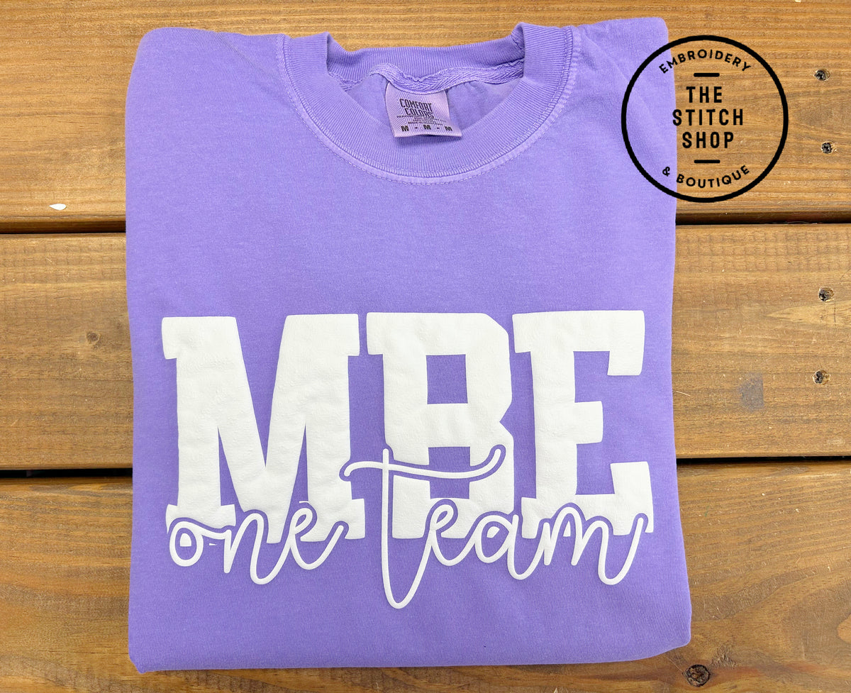 MBE Faculty Comfort Colors Shirts - MBE One Team – The Stitch Shop